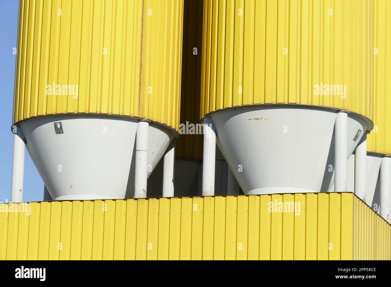 Yellow silos for building material in Hemelinger Hafen, Bremen, Germany ...