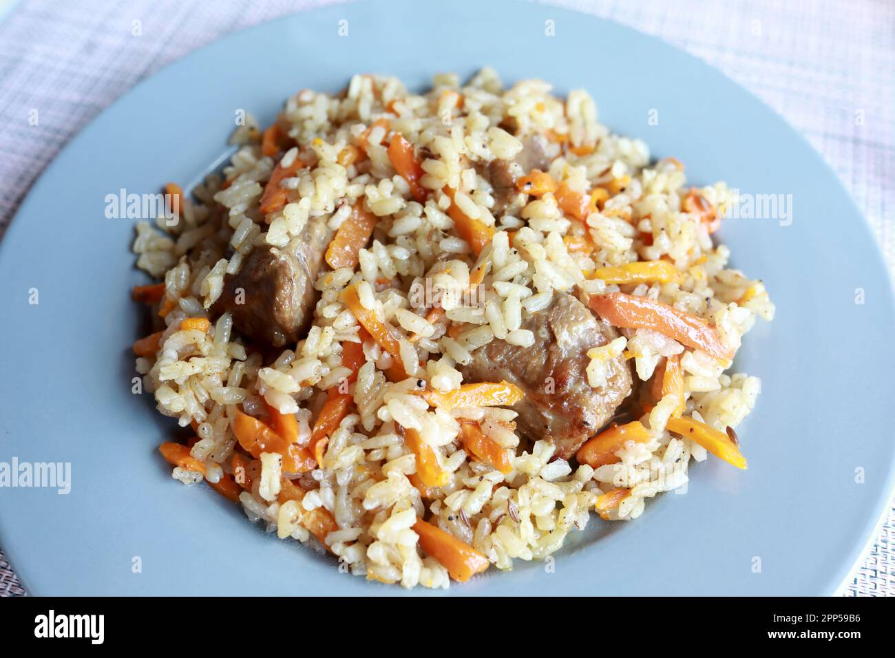 Pilaf plate with beef in a restaurant Stock Photo - Alamy