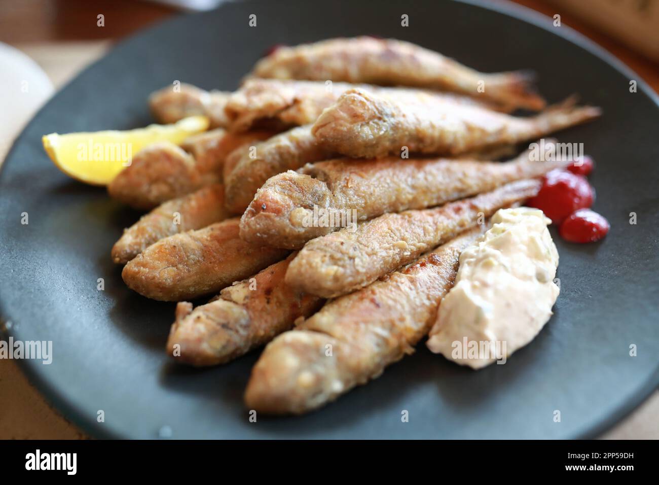 Fresh fish mullet in plate hi-res stock photography and images - Alamy