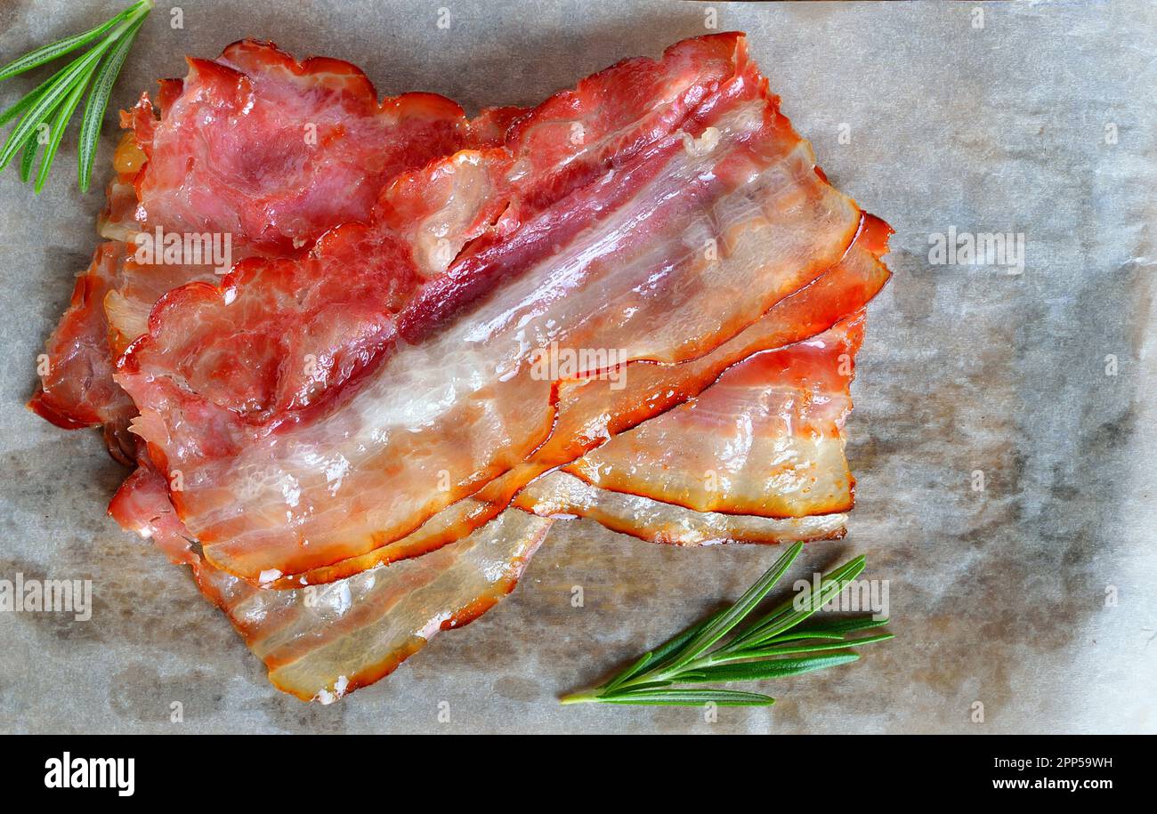 Fried bacon over paper. Top view, flat lay Stock Photo - Alamy