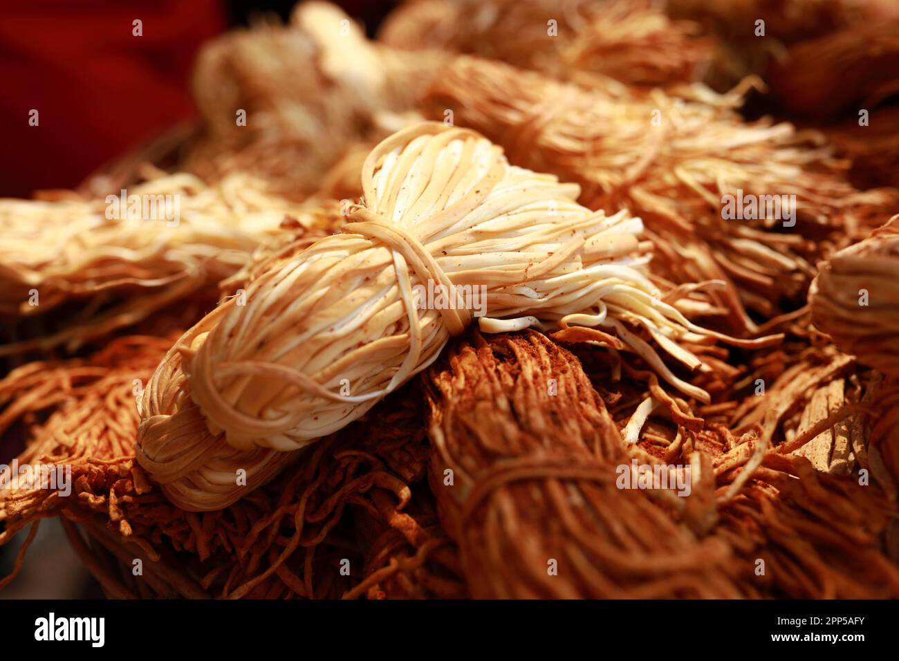 Details of chechil cheese on counter at fair Stock Photo - Alamy