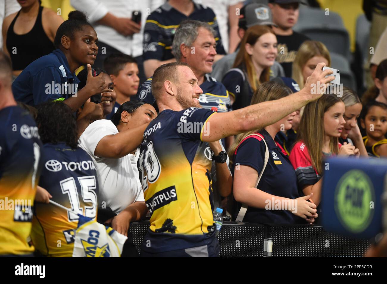 Coen Hess of the Cowboys celebrates with fans during the NRL Round 8 ...