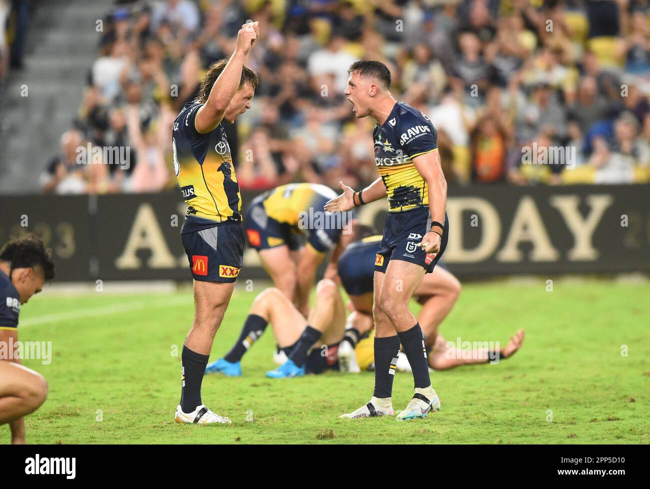 Reuben Cotter and Scott Drinkwater of the Cowboys celebrate the win ...