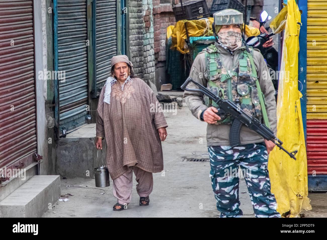 Srinagar, India. 22nd Apr, 2023. An Indian paramilitary trooper stands ...