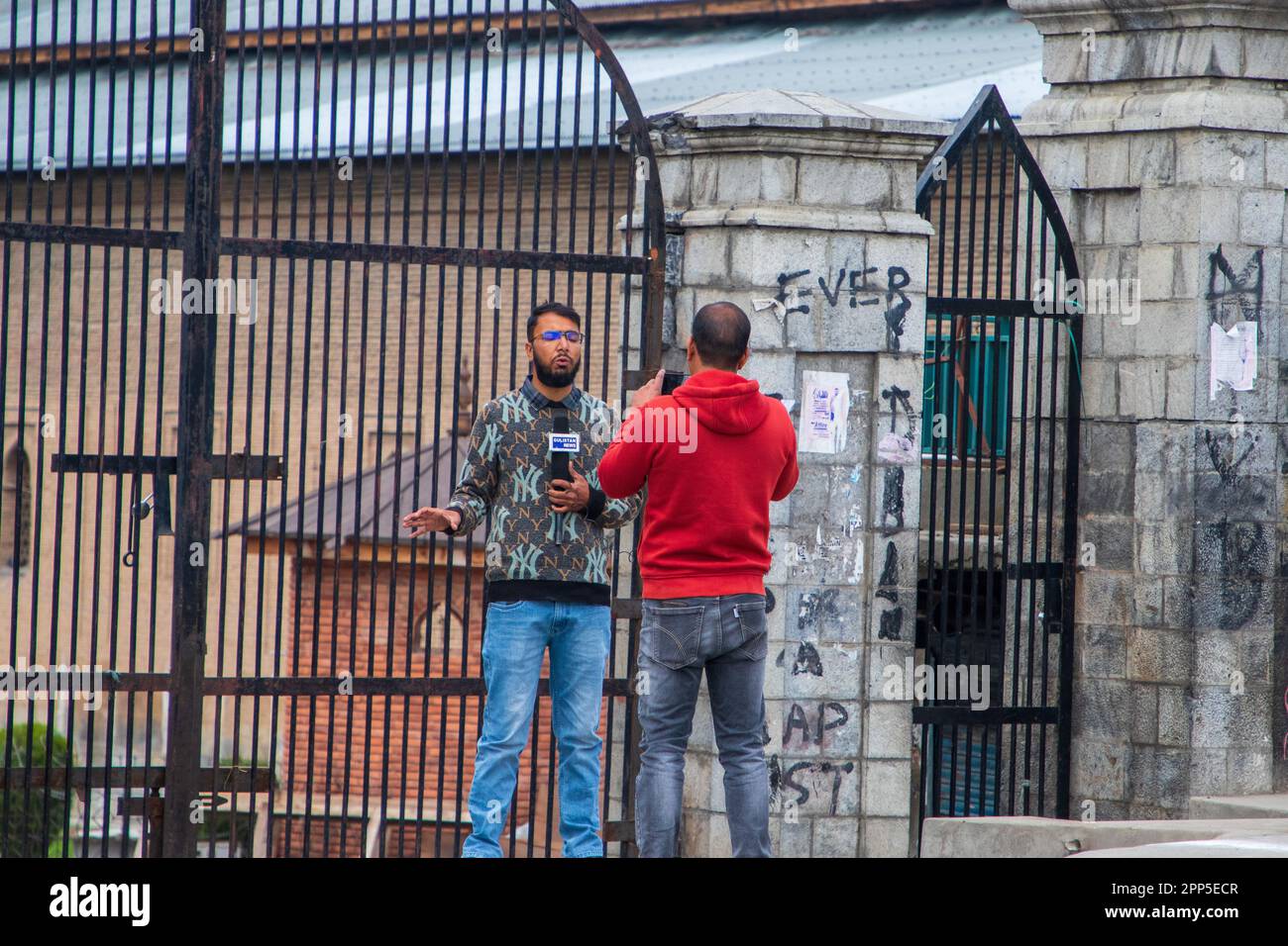 Srinagar, India. 22nd Apr, 2023. Kashmiri journalist seen reporting ...