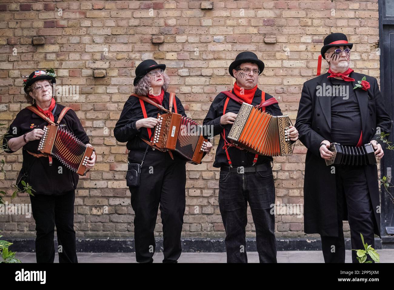 Madder Mill Molly perform outside The Horseshoe Inn, Bermondsey, London ...