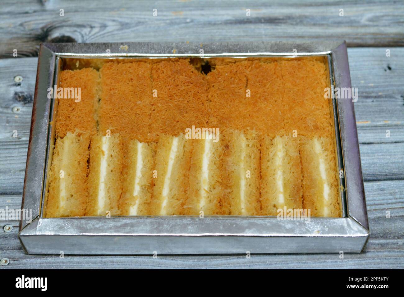 A traditional middle eastern dessert Knafeh Konafa made with spun ...