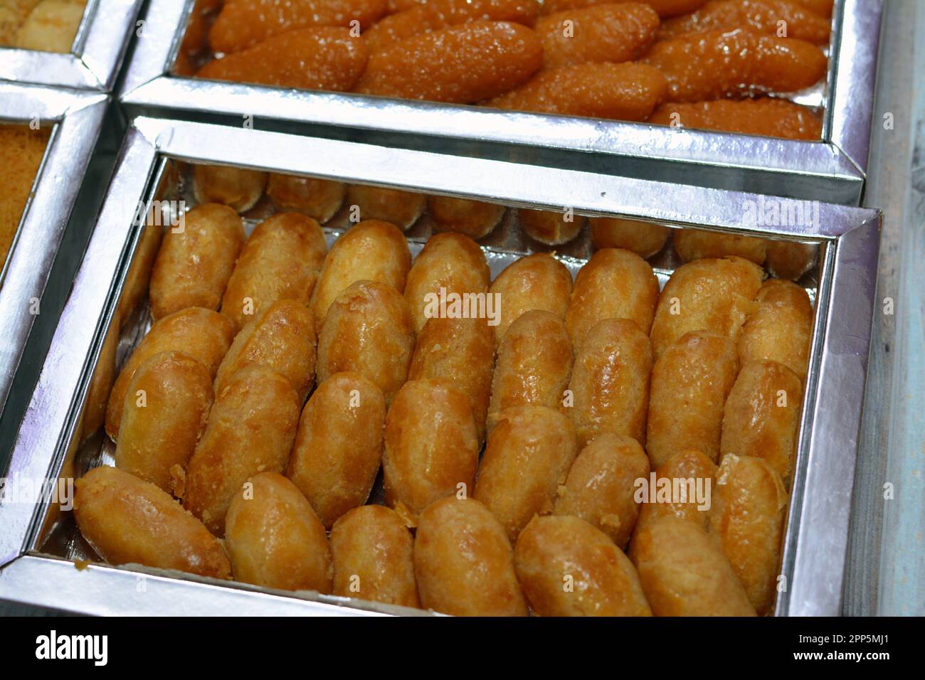 Different types of Eastern sweets of Baklava covered and stuffed with ...