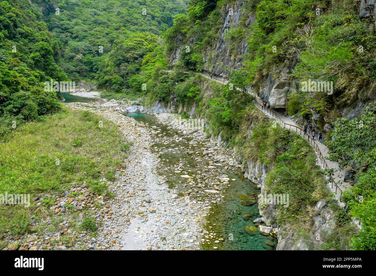 Shakadang Trail (Mysterious Valley Trail) through green mountain and ...