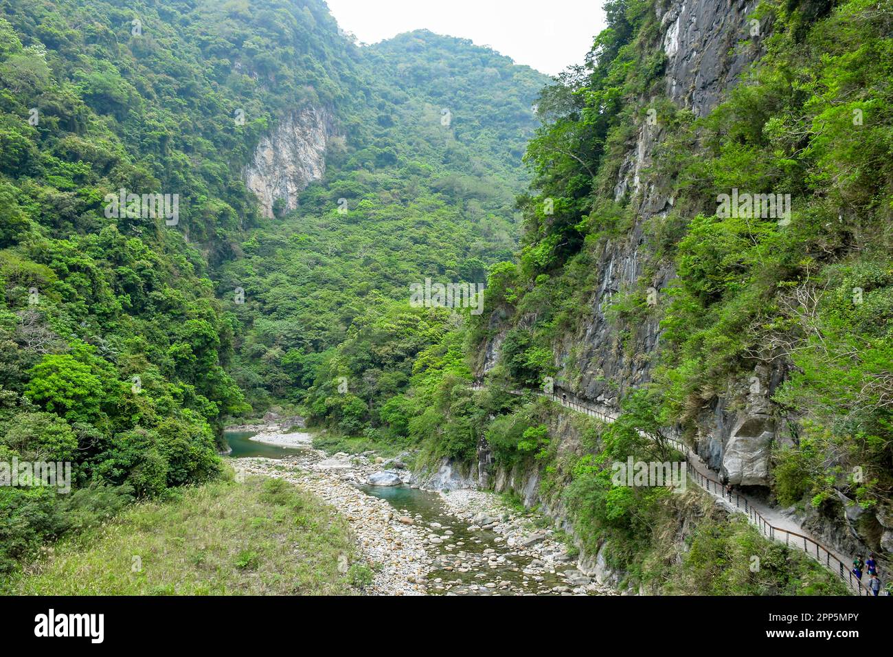 Shakadang Trail (Mysterious Valley Trail) through green mountain and ...