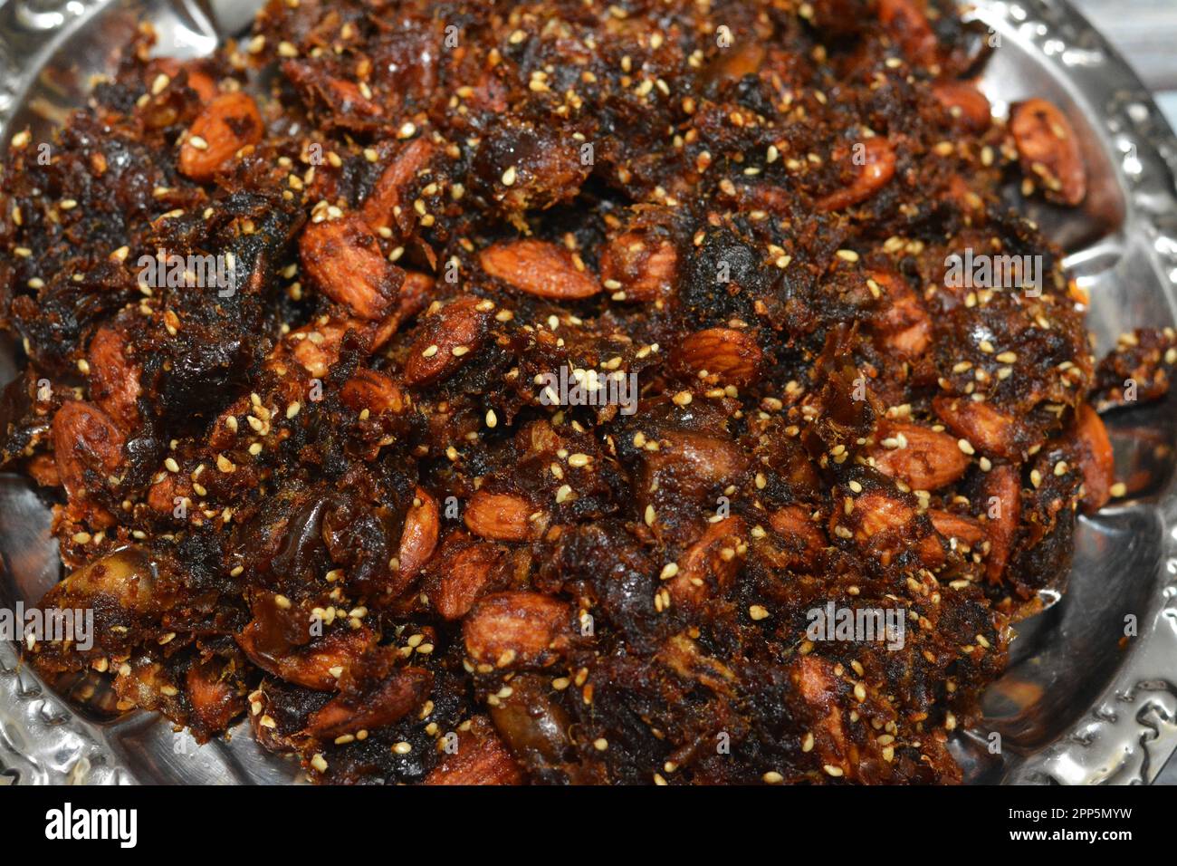 pressed black dates Agwa or Ajwa without kernels with almond and sesame ...