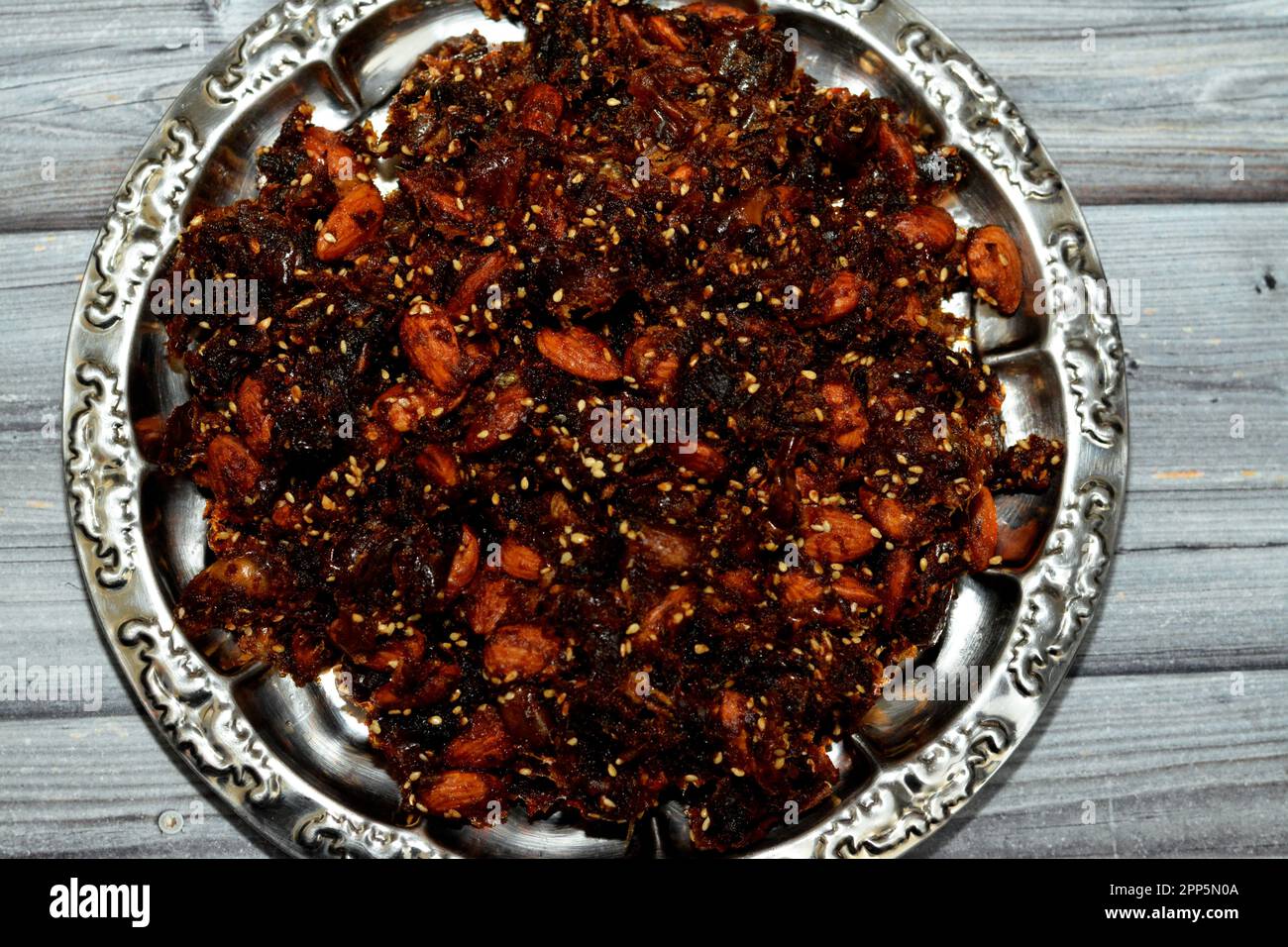 pressed black dates Agwa or Ajwa without kernels with almond and sesame ...