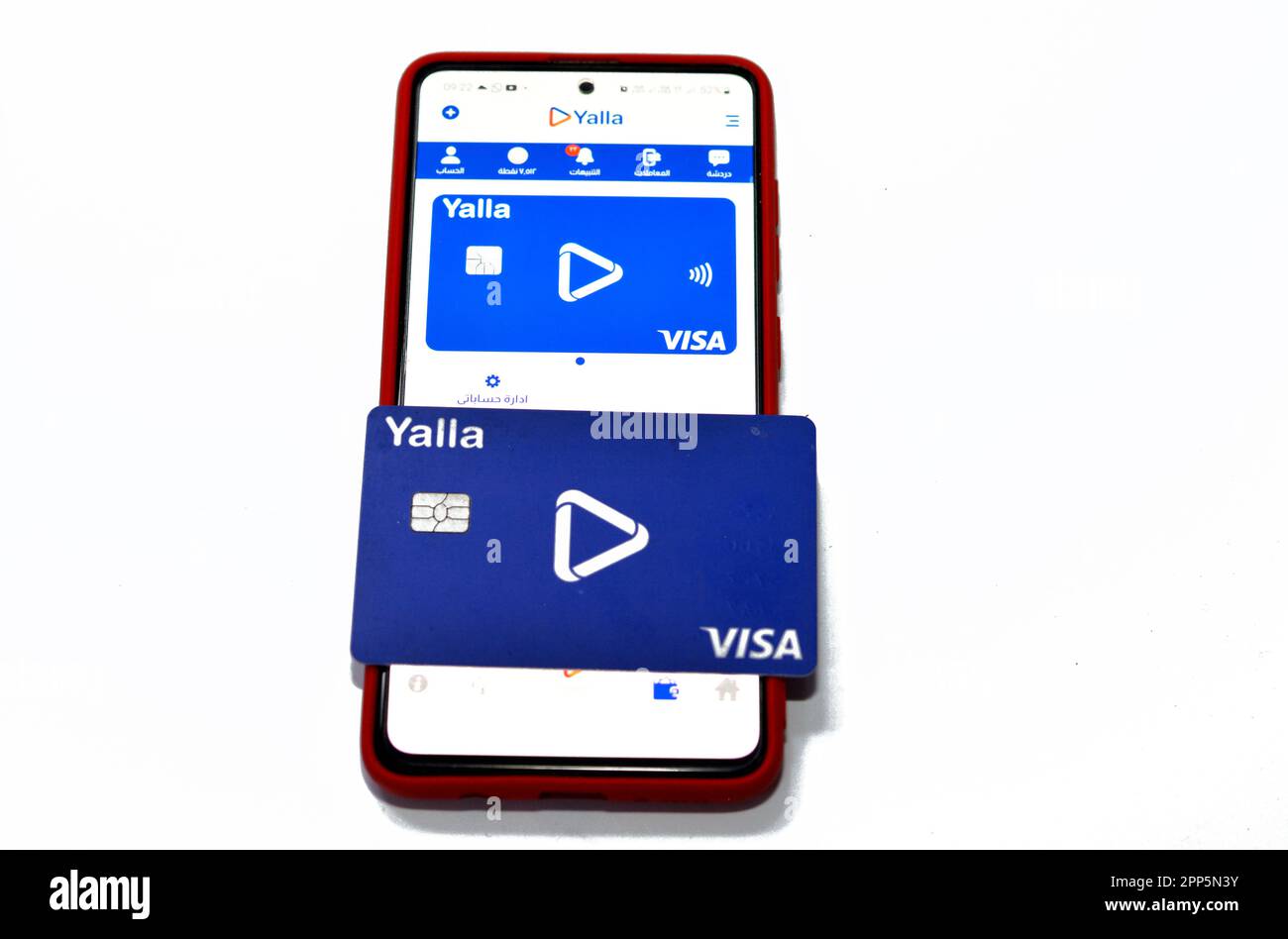 Cairo, Egypt, April 8 2023: Yalla VISA card of Egypt post on A cellular phone with Yalla super ...