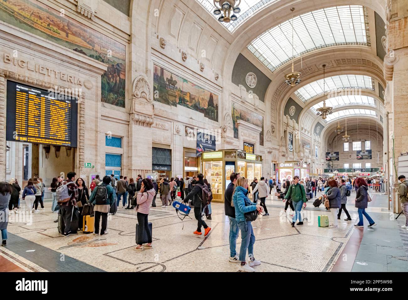 People walking through the magnificent interior of the ground level ...