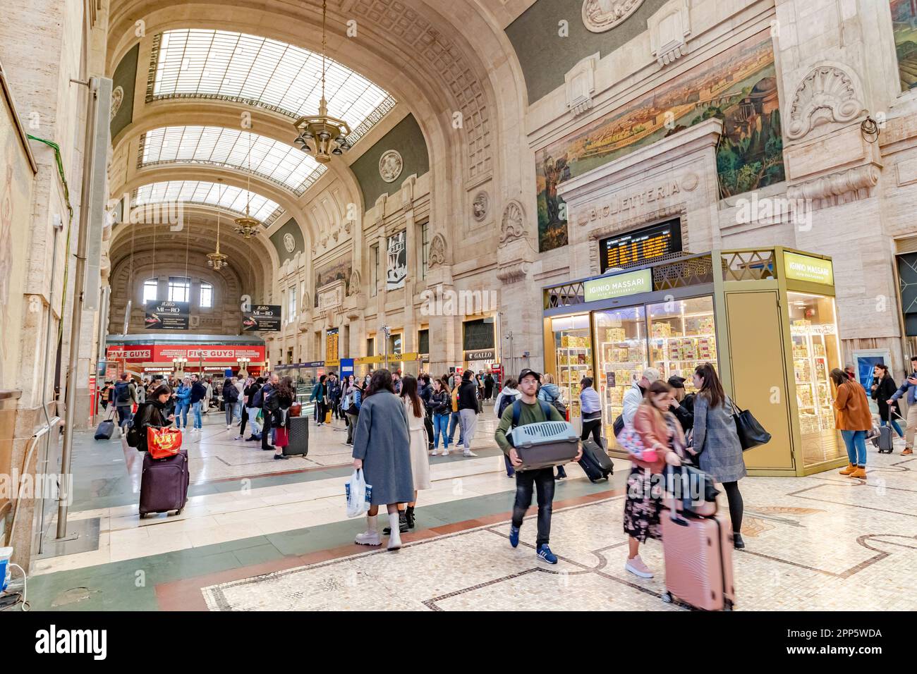 People walking through the magnificent interior of the ground level ...