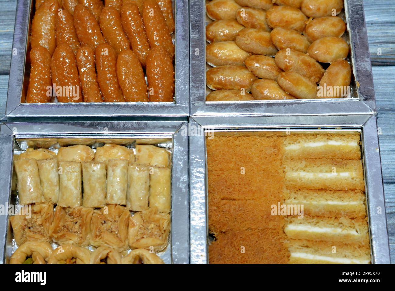 Different types of Eastern sweets of Baklava covered and stuffed with ...