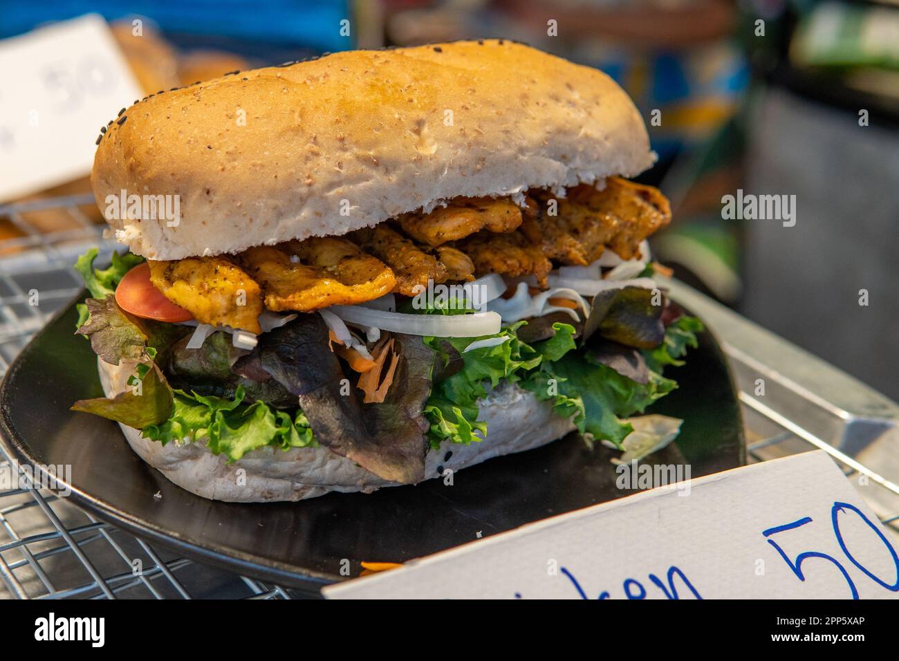 Various street food being sold at the walking street market in Pai, Mae ...