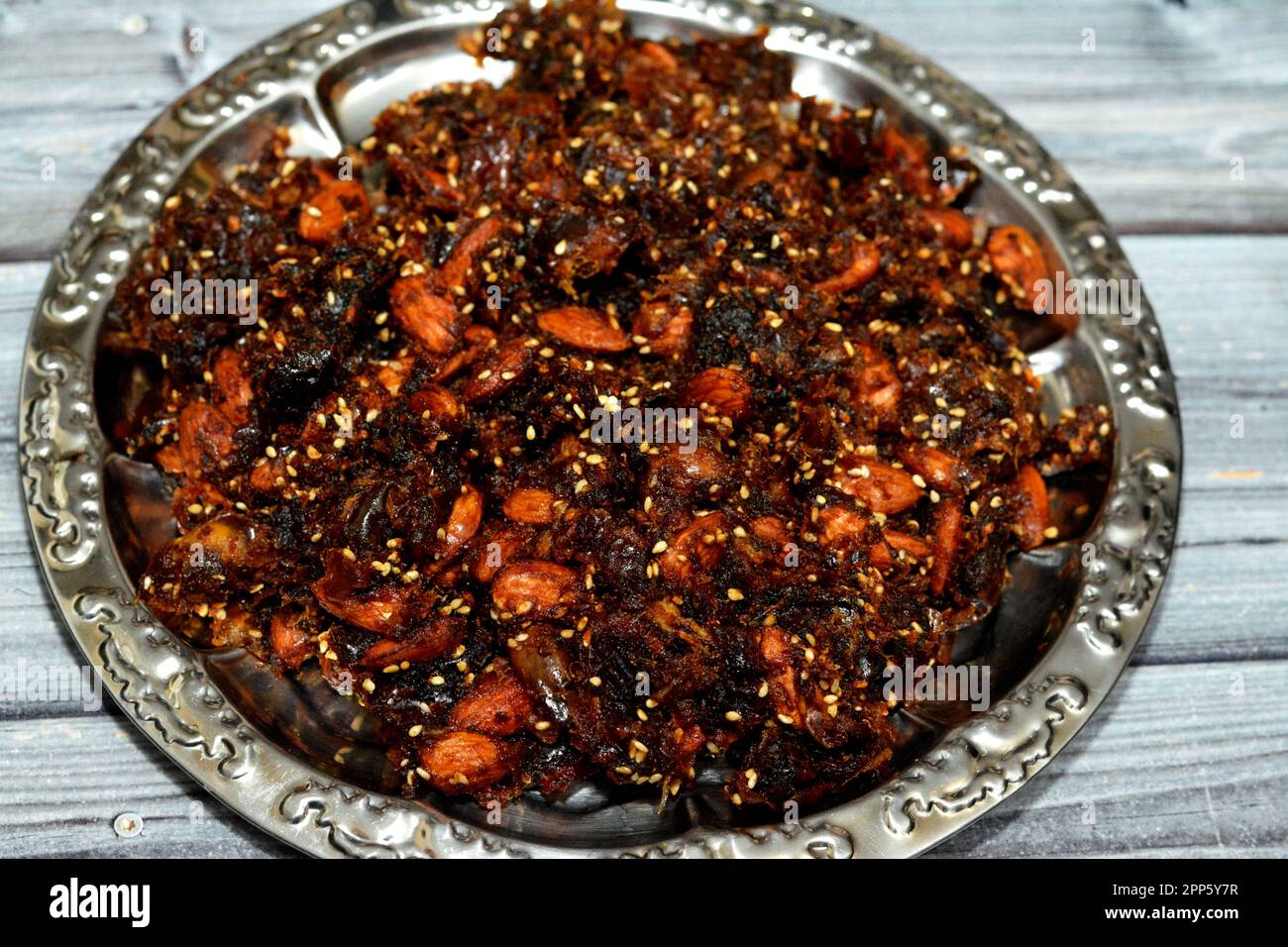 pressed black dates Agwa or Ajwa without kernels with almond and sesame ...