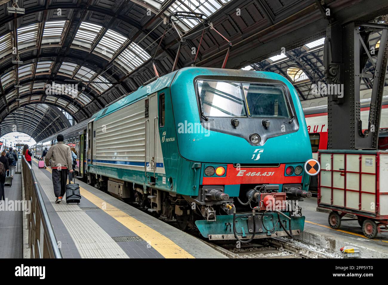A regional train Trenitalia class E- 464 waiting at the platform at Milano Centrale railway ...