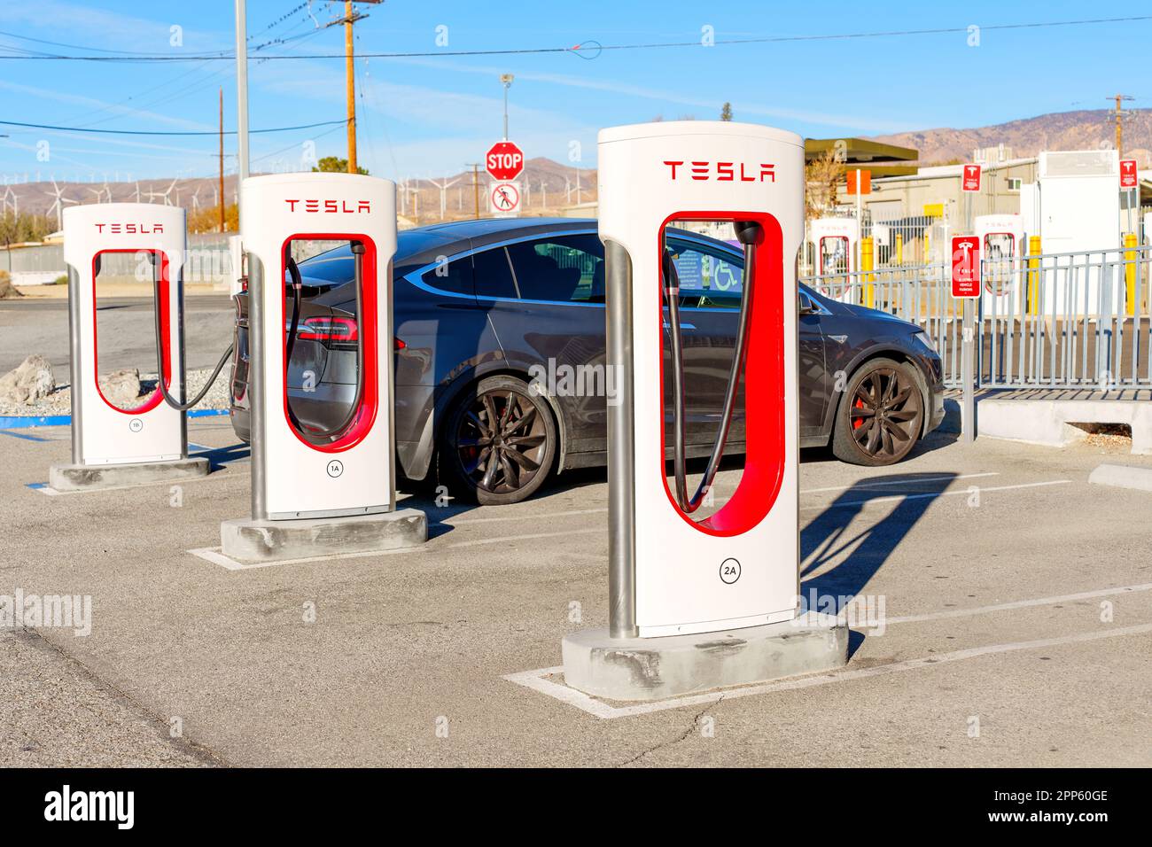 California, USA - December 23, 2022: Tesla charging up at a public ...
