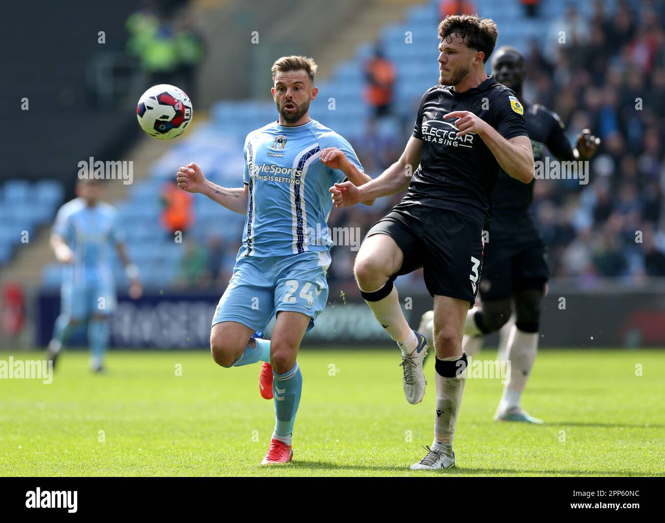 Coventry City's Matthew Godden (left) and Reading's Tom Holmes battle ...