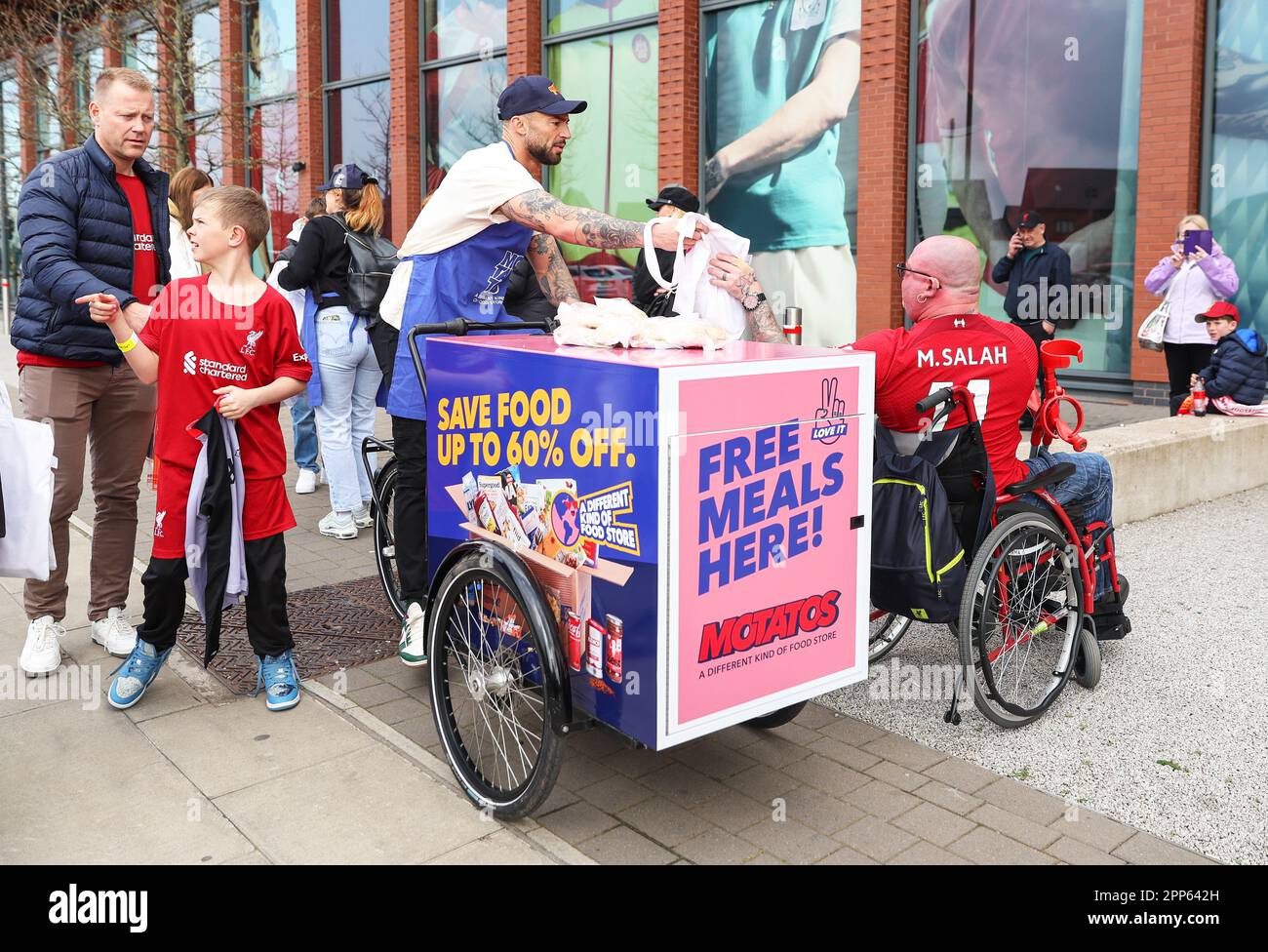 EDITORIAL USE ONLY Jake Quickenden helps distribute 580 meals in ...