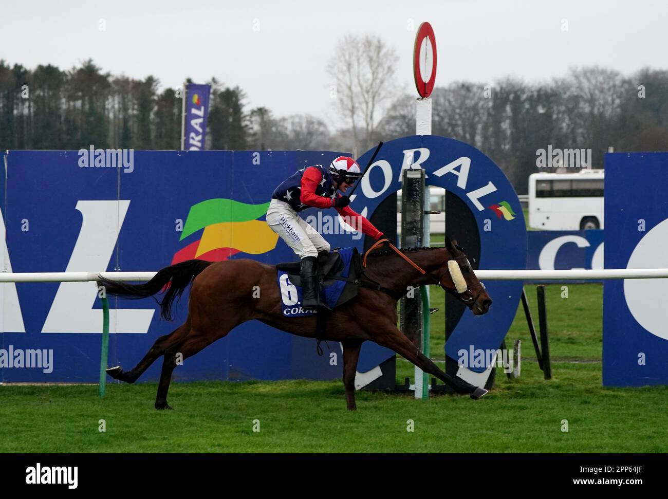 Kitty's Light ridden by jockey Jack Tudor cross the finish line to win ...