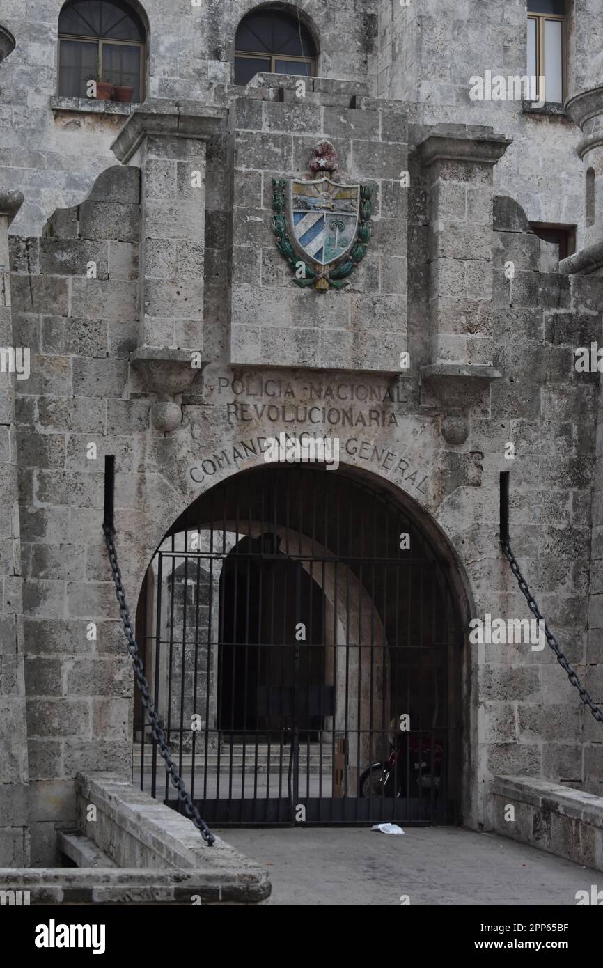 An ornate castle with a large arched gate entrance Stock Photo - Alamy