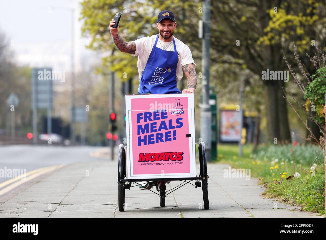 EDITORIAL USE ONLY Jake Quickenden helps distribute 580 meals in ...