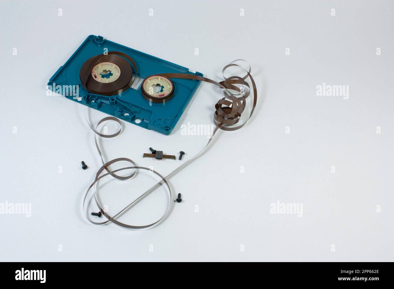 parts of cassette tape on white background Stock Photo - Alamy