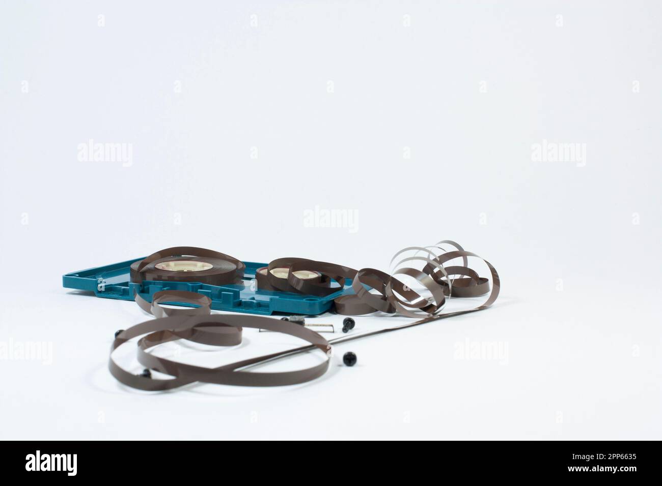 parts of cassette tape on white background Stock Photo - Alamy