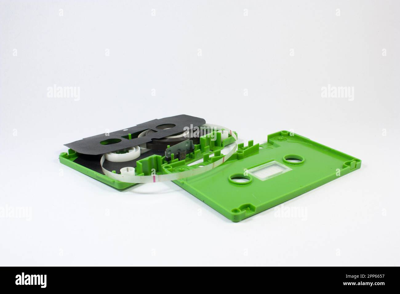 parts of cassette tape on white background Stock Photo - Alamy