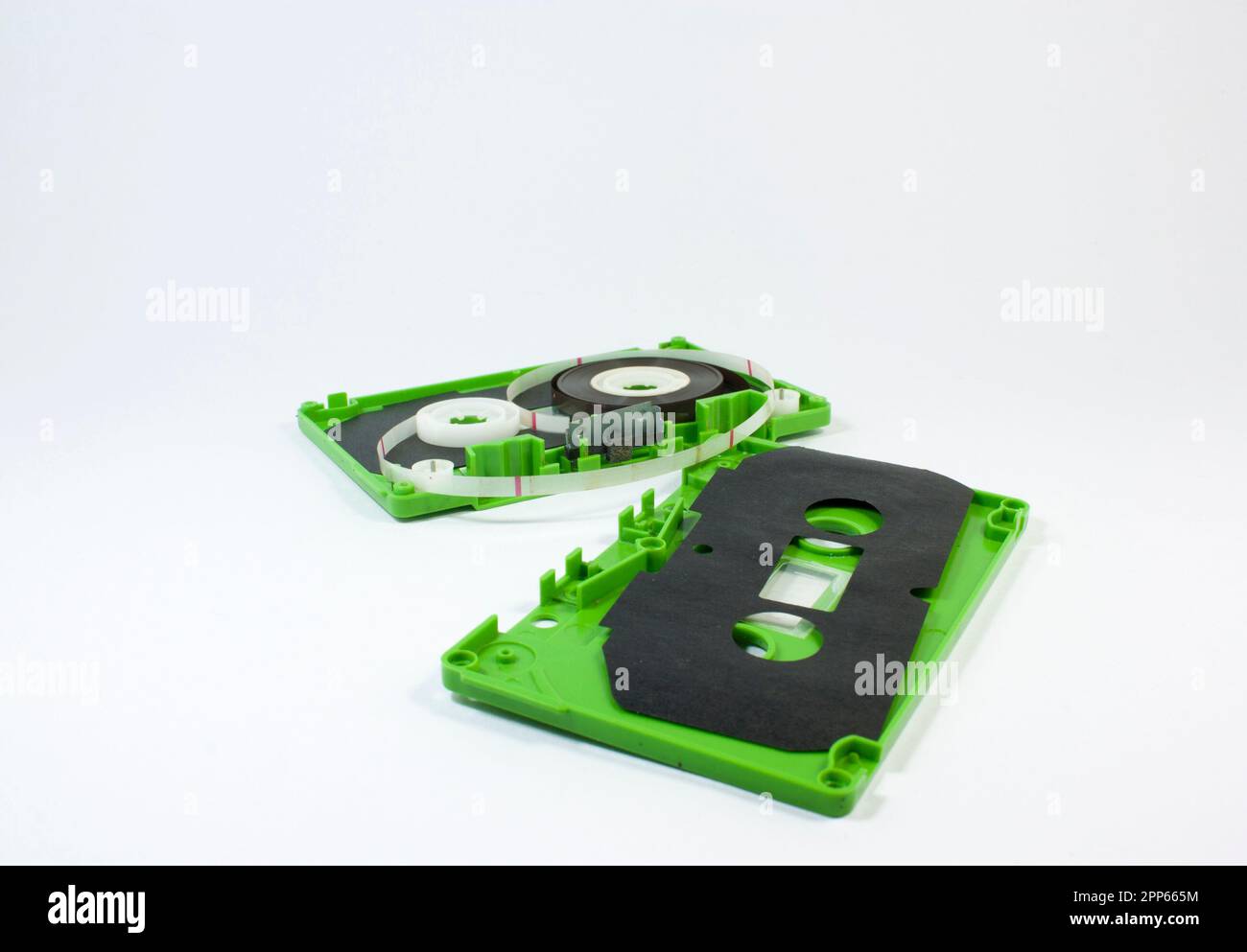 parts of cassette tape on white background Stock Photo - Alamy