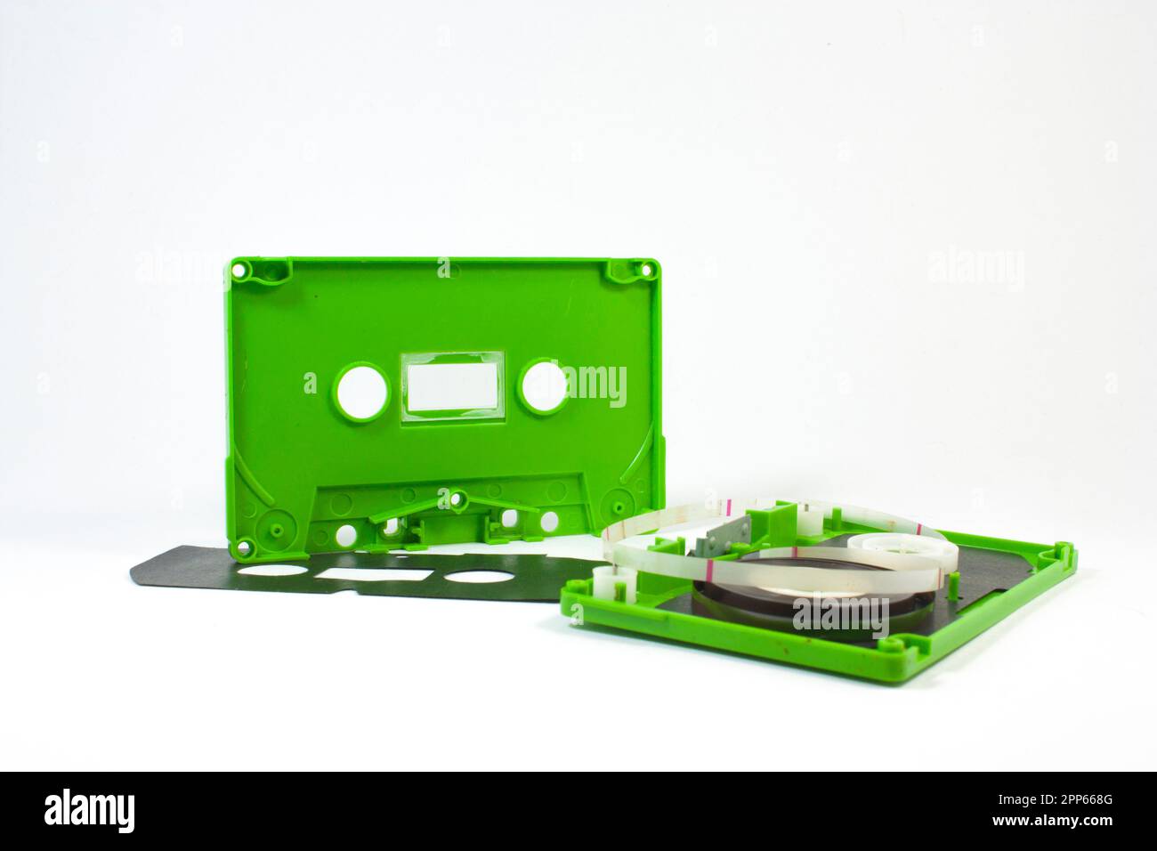 parts of cassette tape on white background Stock Photo - Alamy
