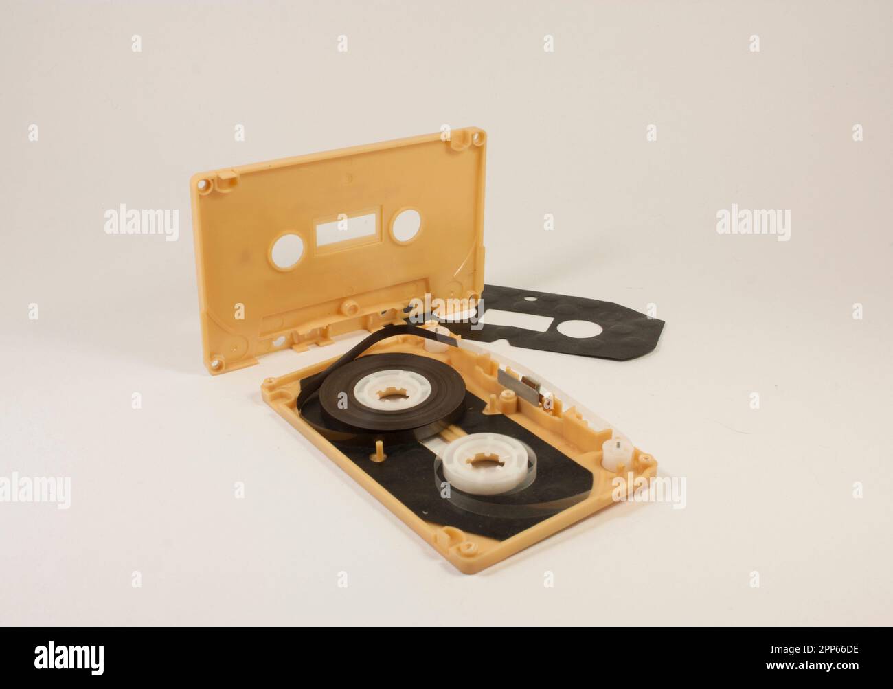 parts of cassette tape on white background Stock Photo - Alamy