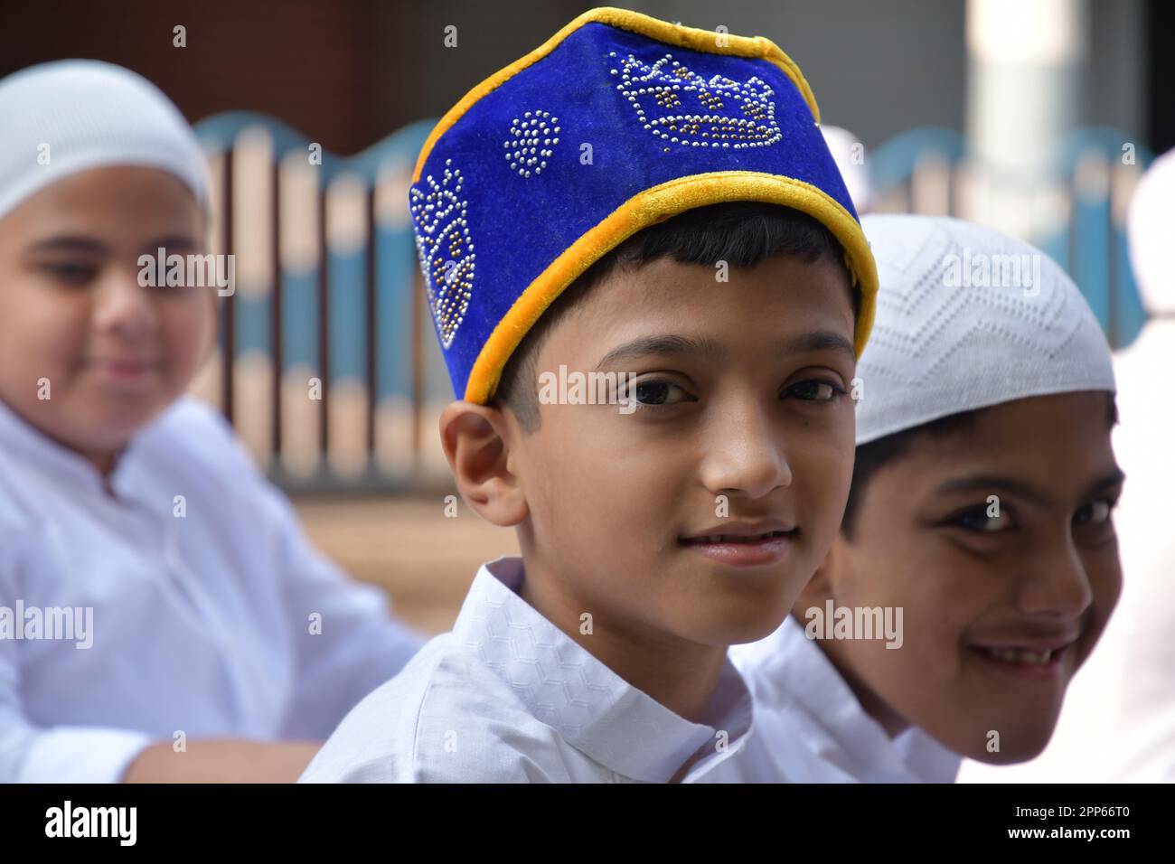 Muslim boys of Kolkata wait before the special prayers on the occasion ...