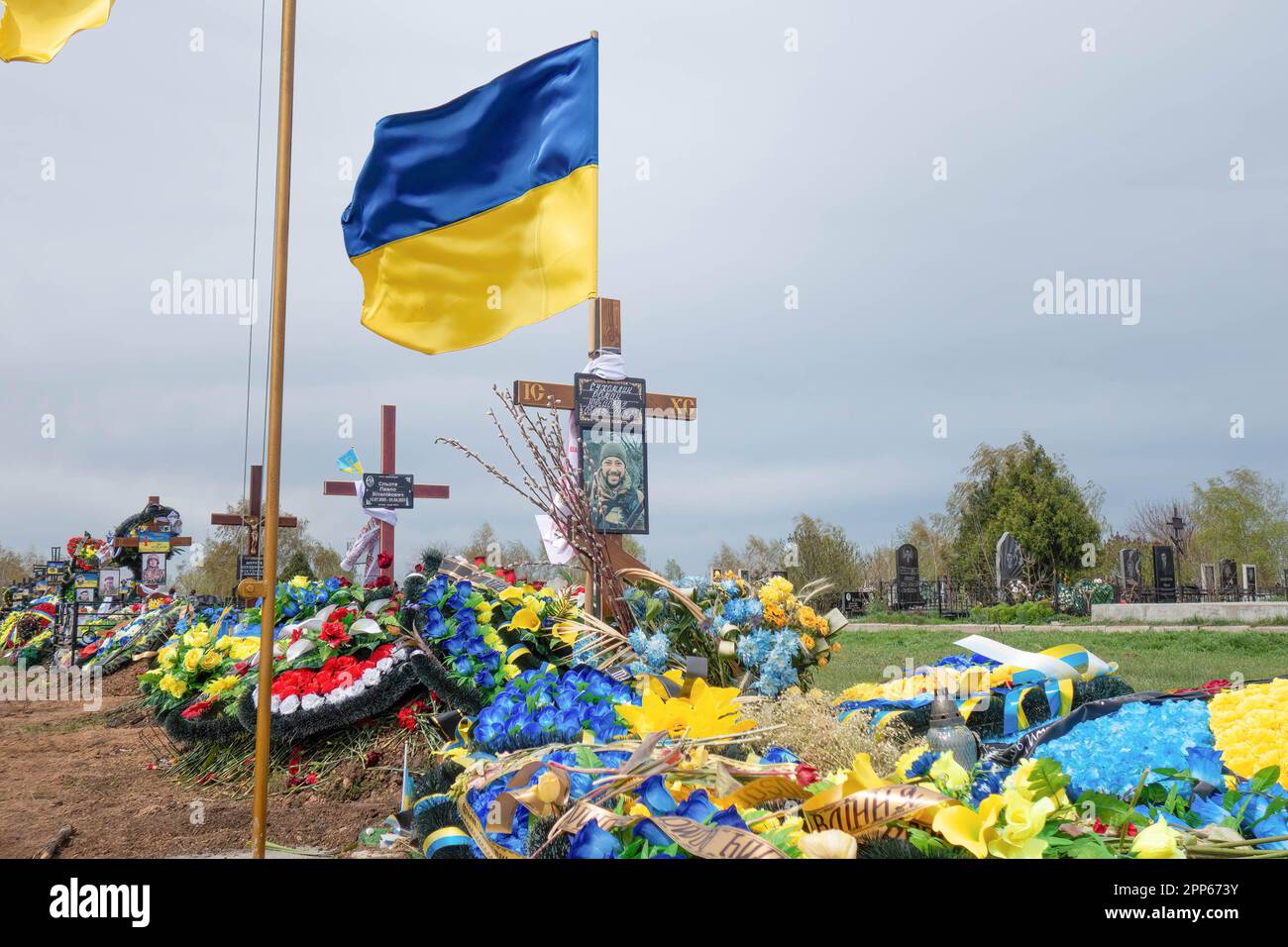 Flowers and Ukrainian flags seen on the graves of soldiers and officers ...