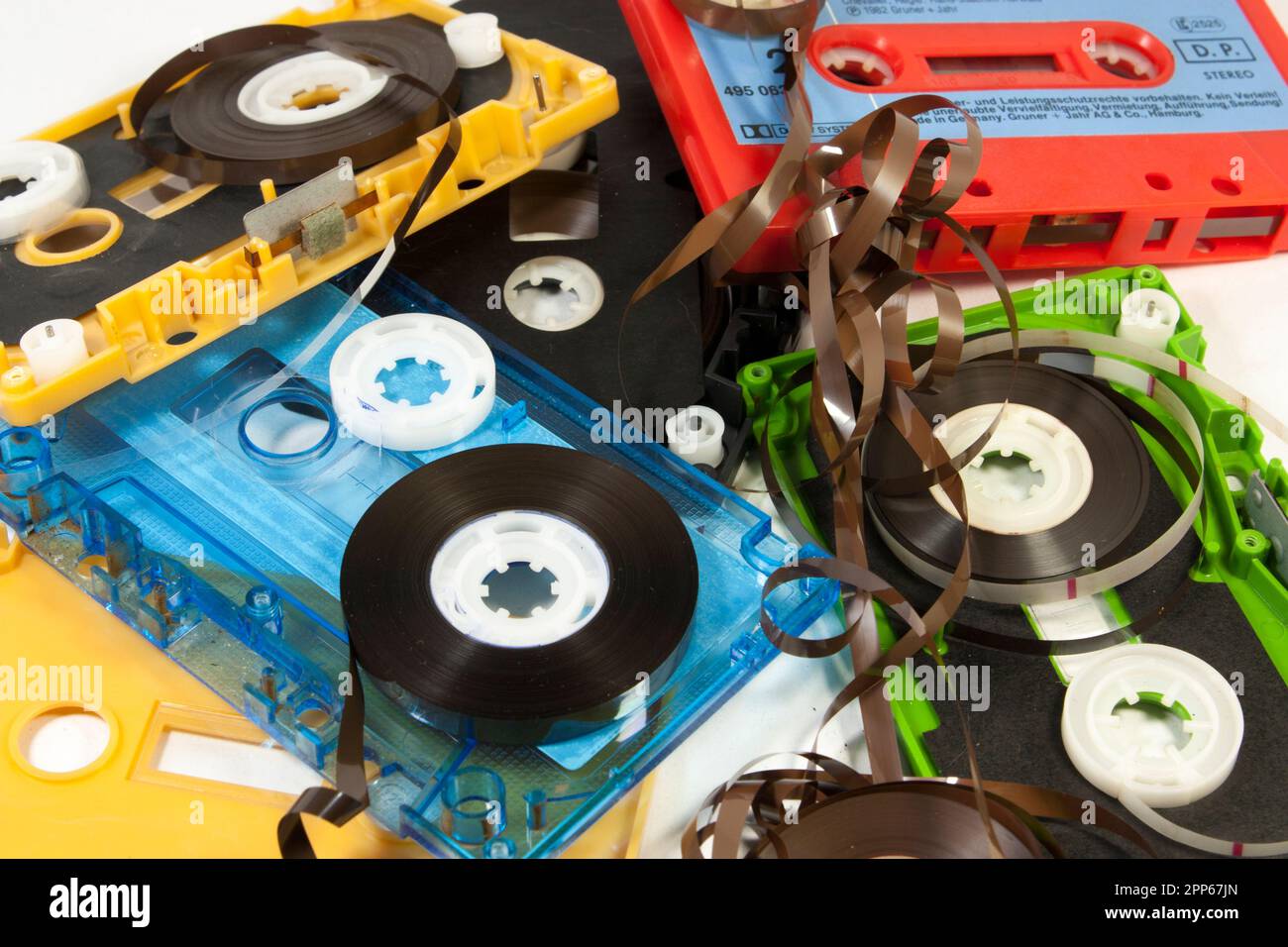 parts of cassette tape on white background Stock Photo - Alamy