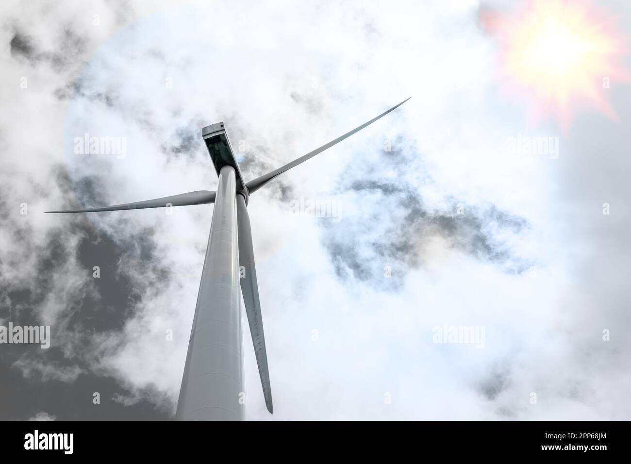 Bottom view of wind turbine generating electricity clean energy with ...