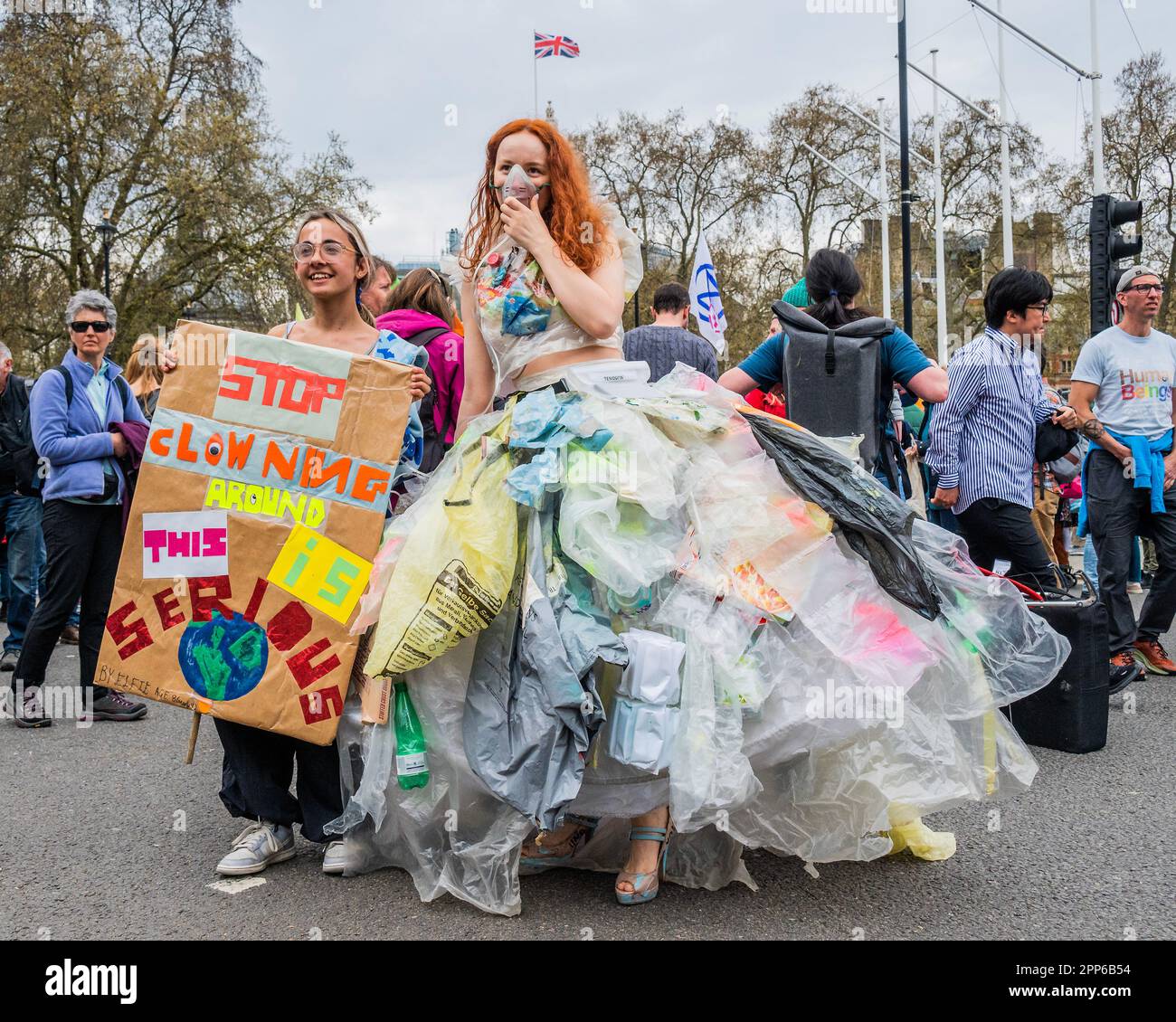 London, UK. 22nd Apr, 2023. A woman wears an oxygen mask and dress made ...