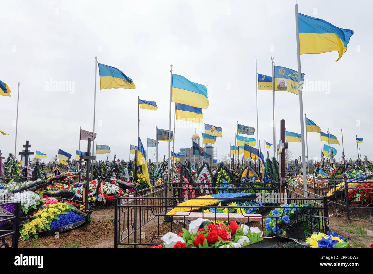 Flowers and Ukrainian flags seen on the graves of soldiers and officers ...