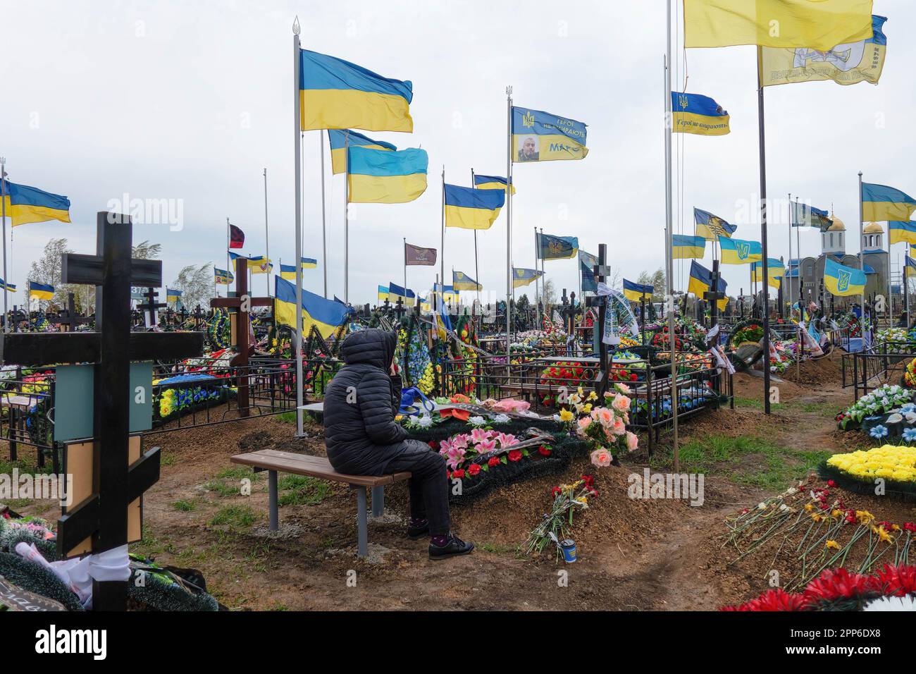 Flowers and Ukrainian flags seen on the graves of soldiers and officers ...