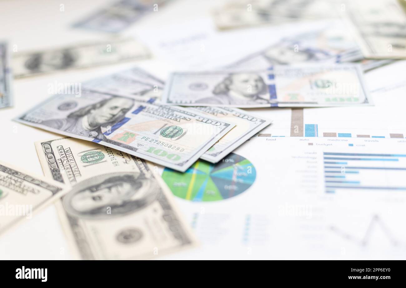 Accounting charts and graphs with us dollar bills pen calculator. Stock ...