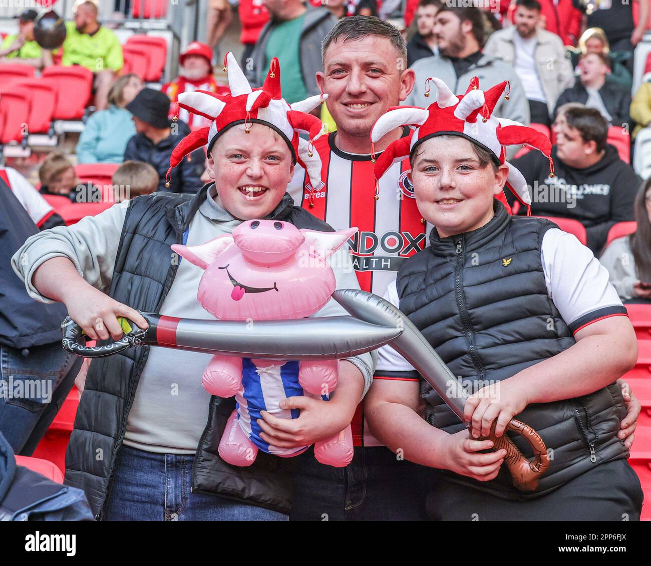 London, UK. 22nd Apr, 2023. Two Sheffield United fans with a blow up ...