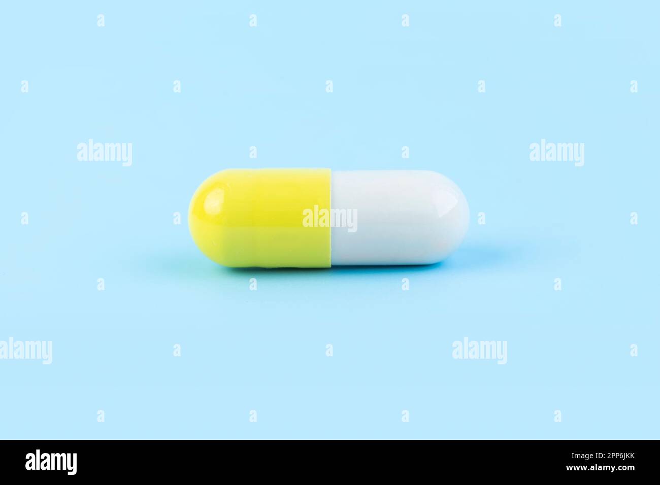 close-up of yellow gelatin capsules pill , oral medical drug filled ...