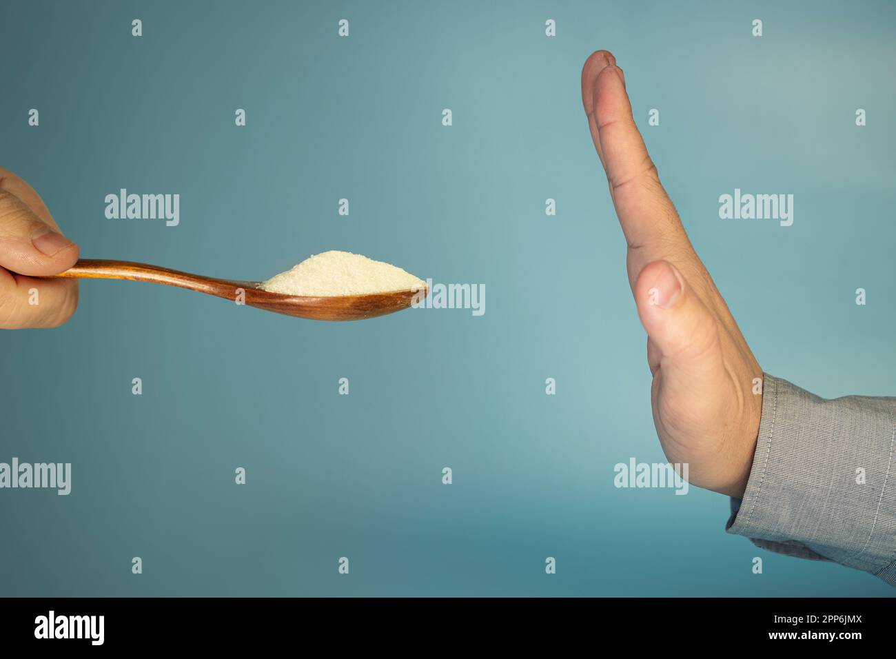 the concept of refusing sweets. The stop hand gesture is a prohibition ...