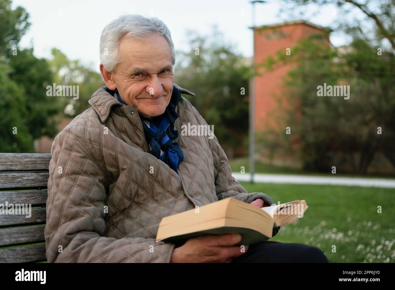 Happy older man reading hi-res stock photography and images - Alamy