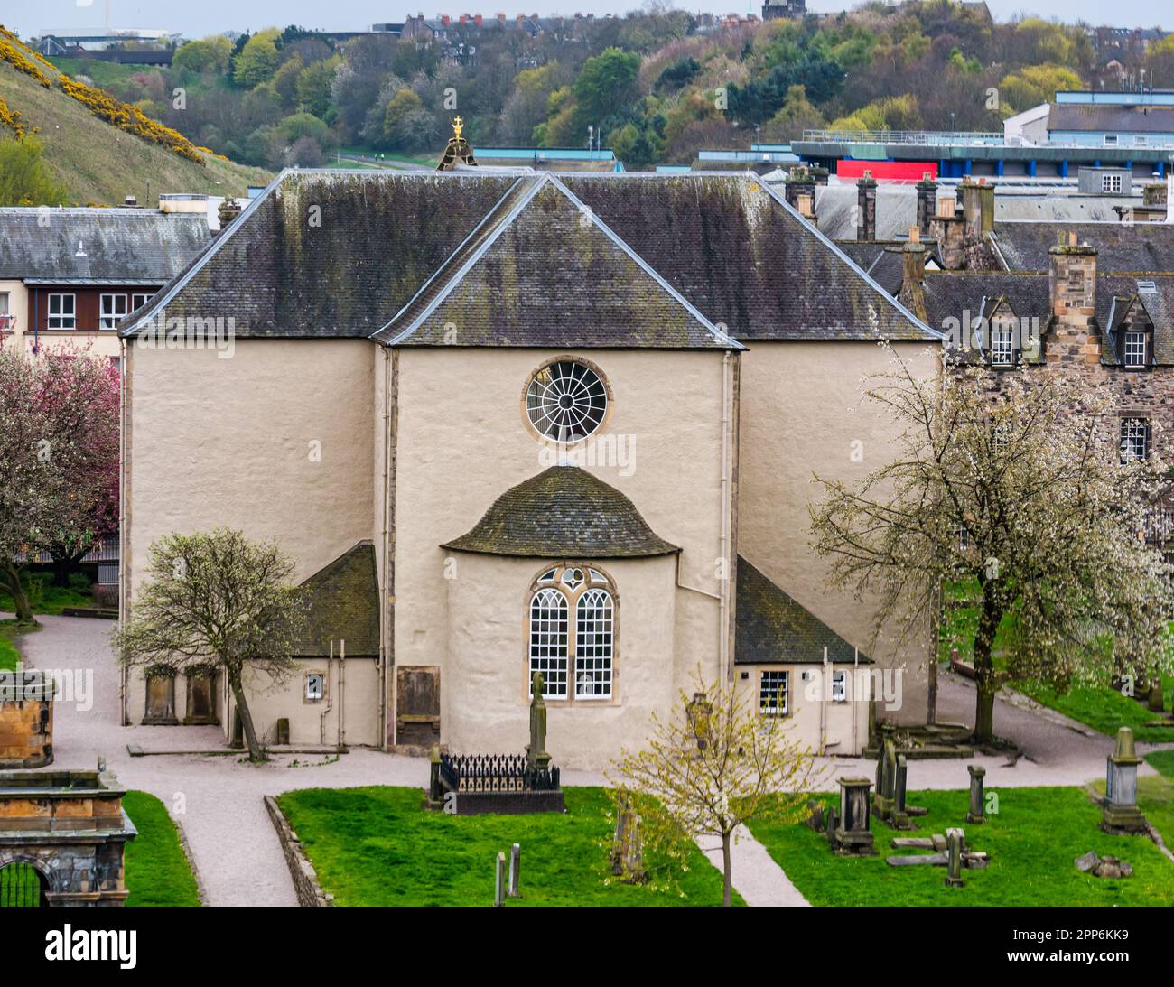 View of rear exterior of Canongate Church and graveyard with old graves ...