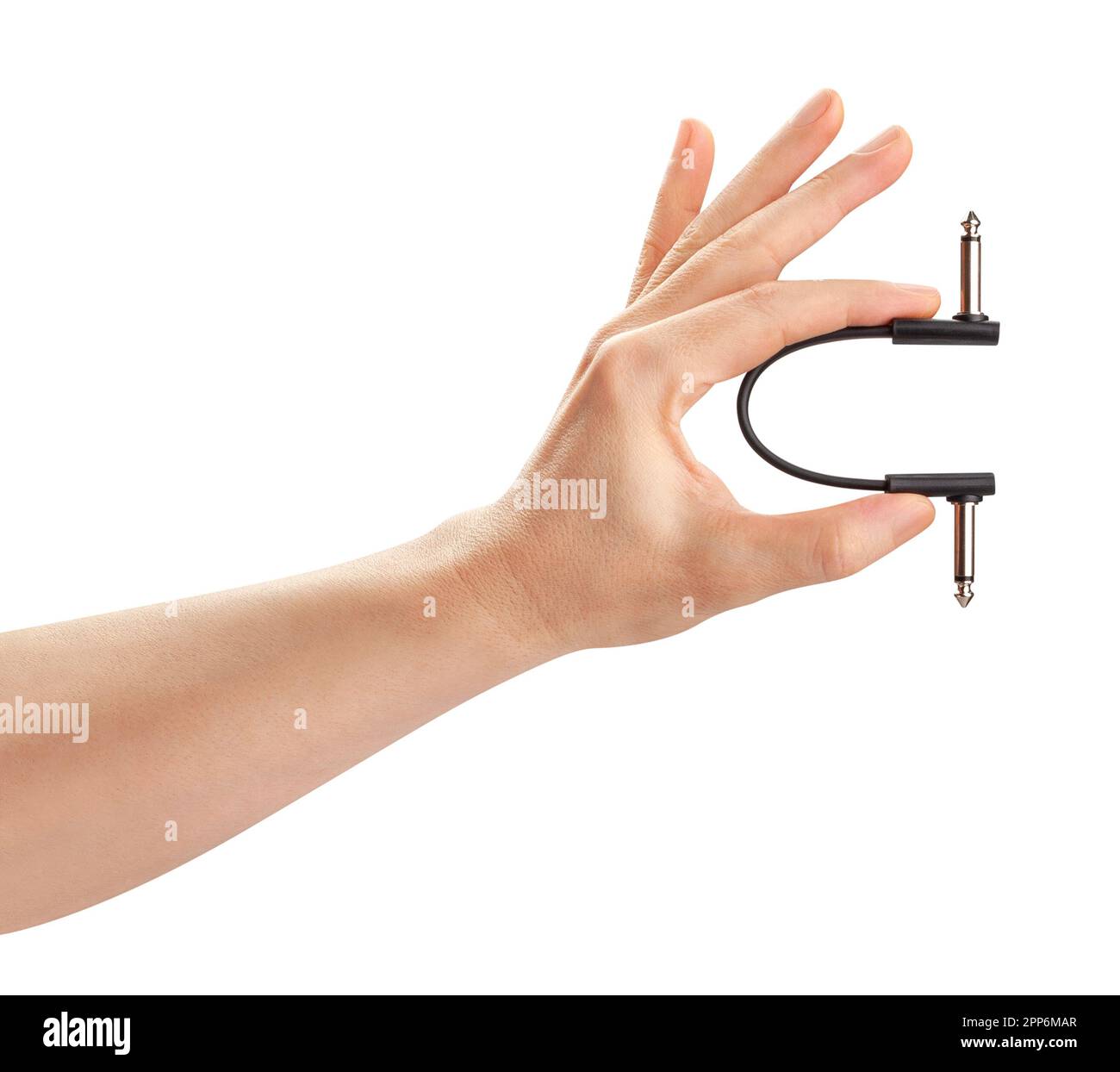 Hand holding audio cable hi-res stock photography and images - Alamy