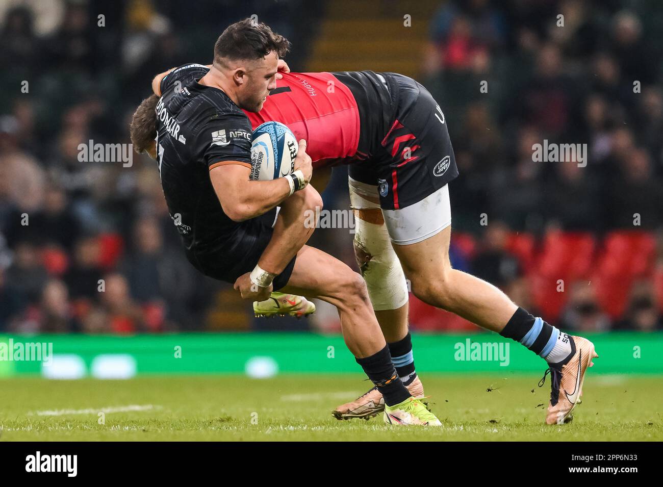 Luke Morgan of Ospreys is tackled by Mason Grady of Cardiff during the ...
